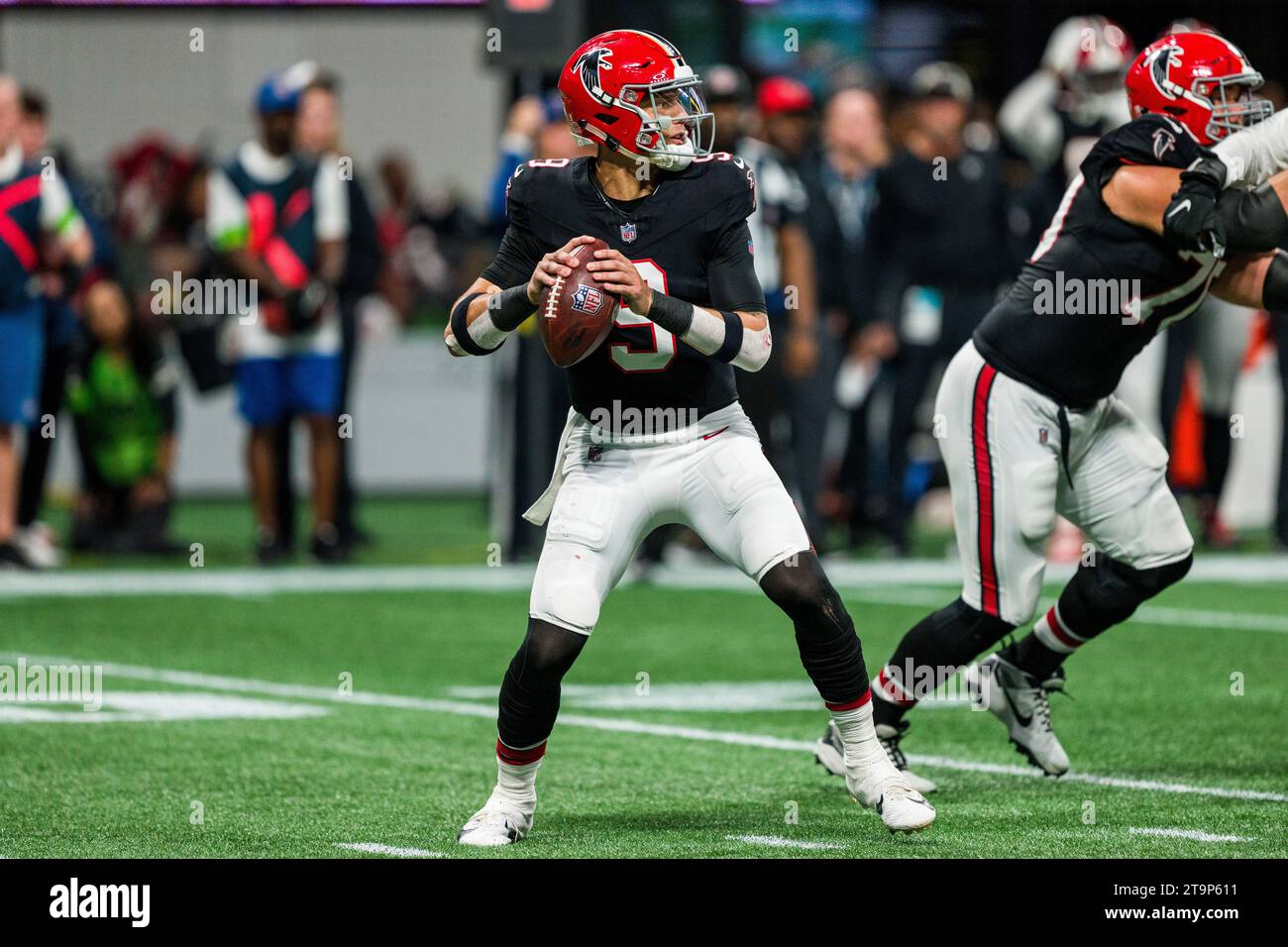 Atlanta Falcons quarterback Desmond Ridder (9) works during the first ...