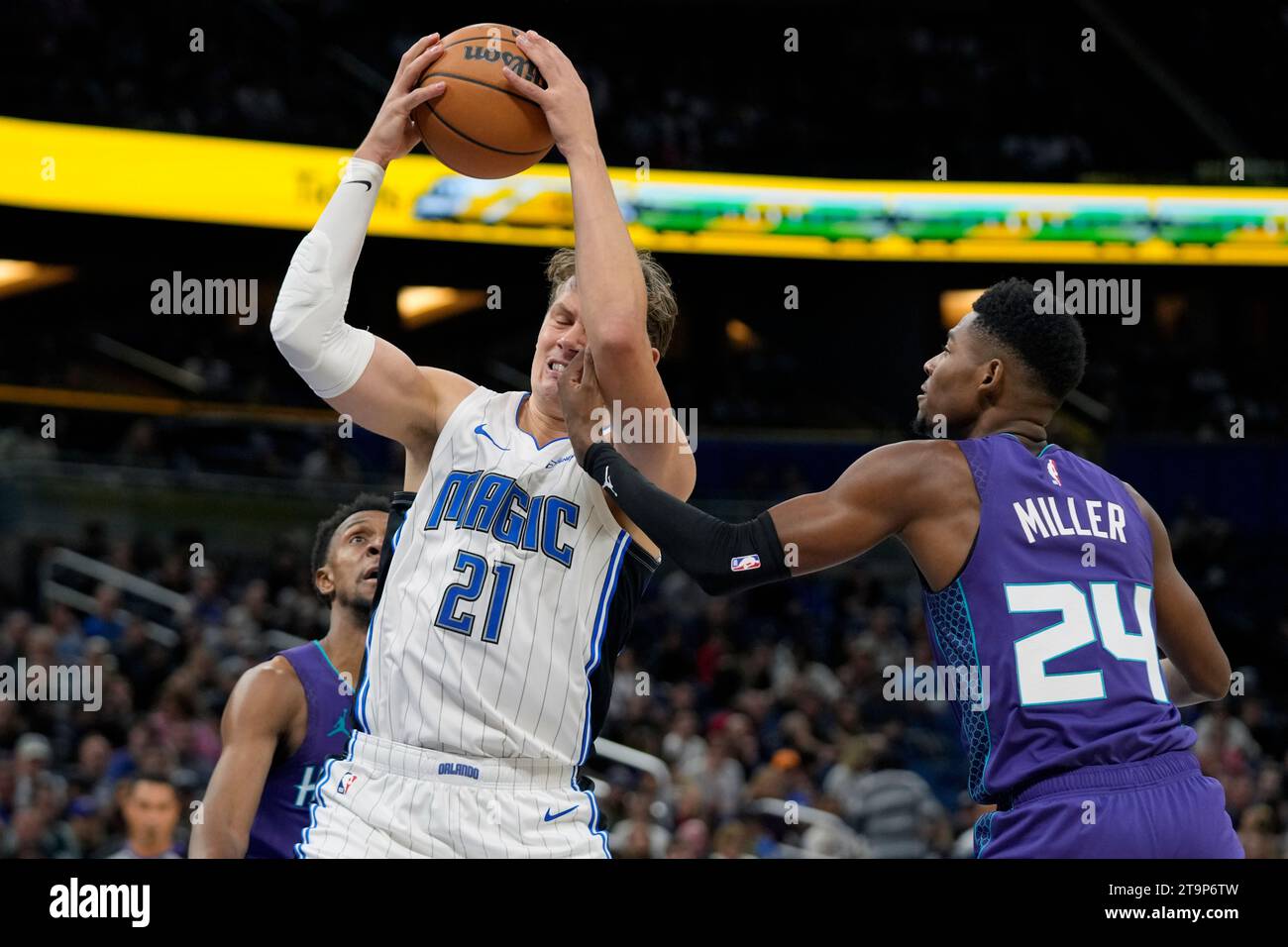 Orlando Magic center Moritz Wagner (21) struggles to get control of a ...