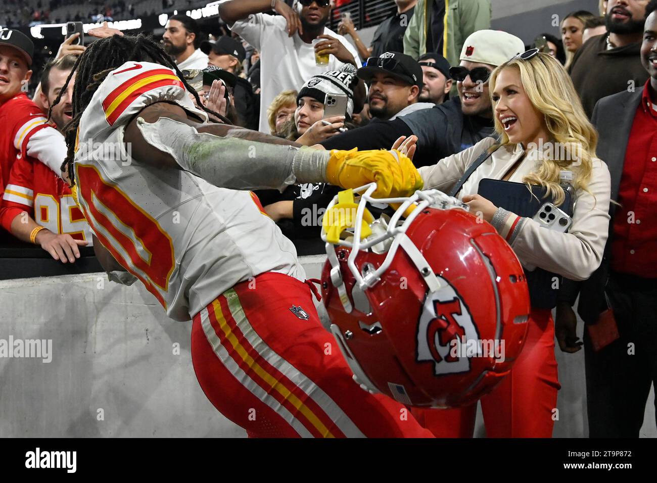 Kansas City Chiefs running back Isiah Pacheco, left, celebrates with ...