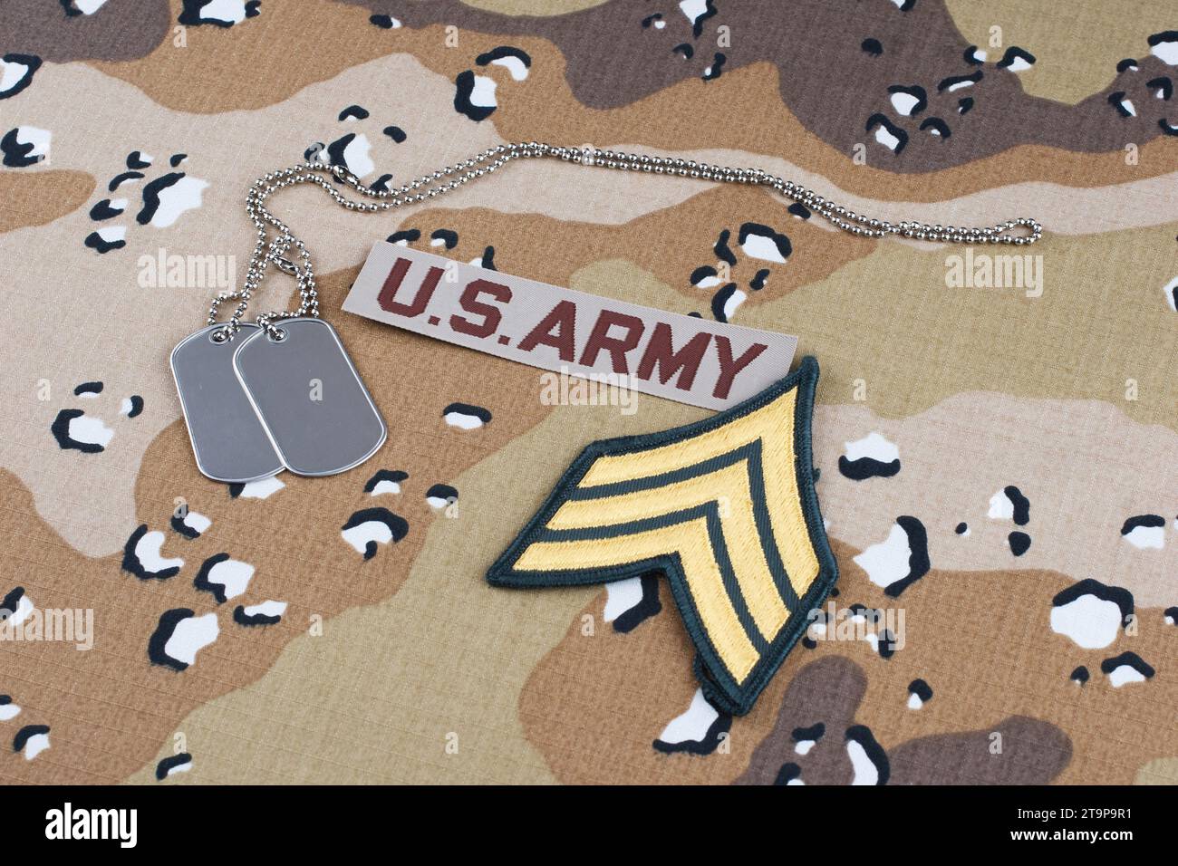 US ARMY sergeant rank patch and dog tags on Desert Battle Dress Uniform ...
