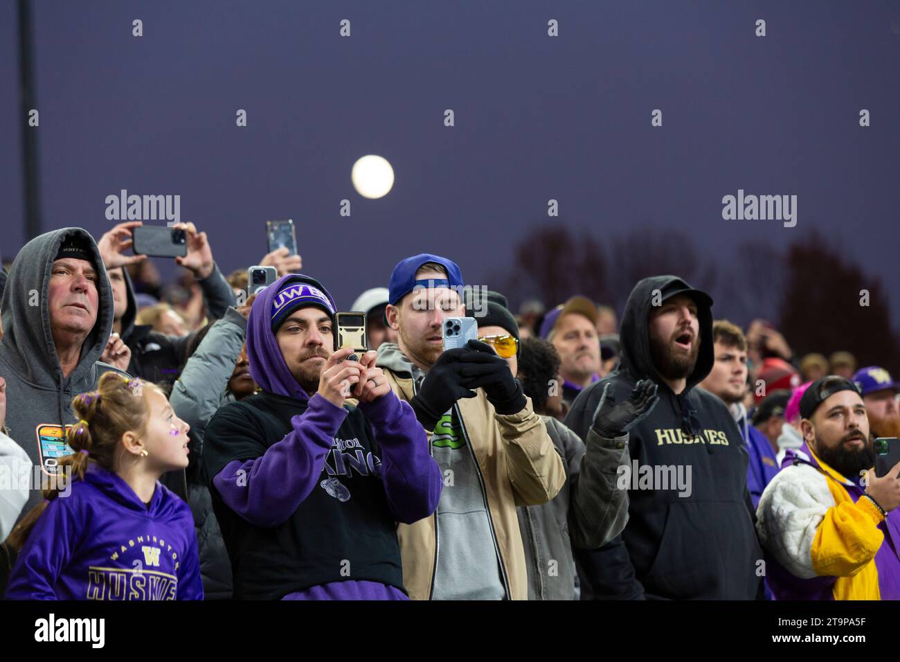 Washington Huskies fans watch the tense final few minutes of the 115th ...