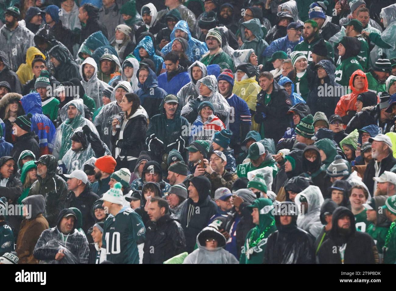 Football fans in rain hi-res stock photography and images - Alamy