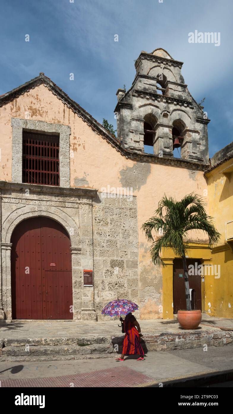 The undeniable Caribbean culture of Cartagena as a woman passes by ...