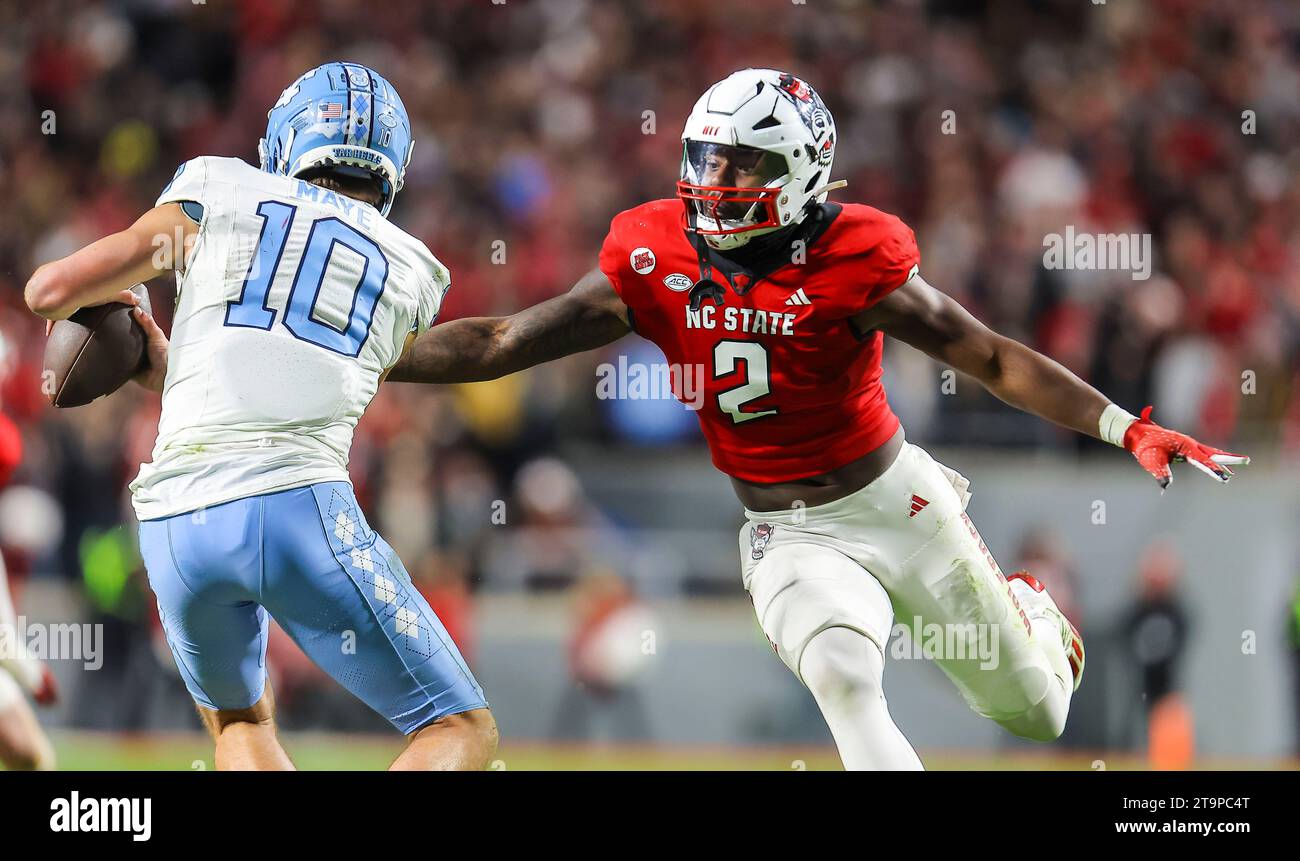 November 25, 2023: NC State senior Jaylon Scott (2) rushes North ...