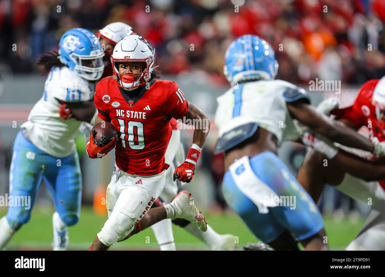 November 25, 2023: NC State freshman Kevin Concepcion (10) runs the ...