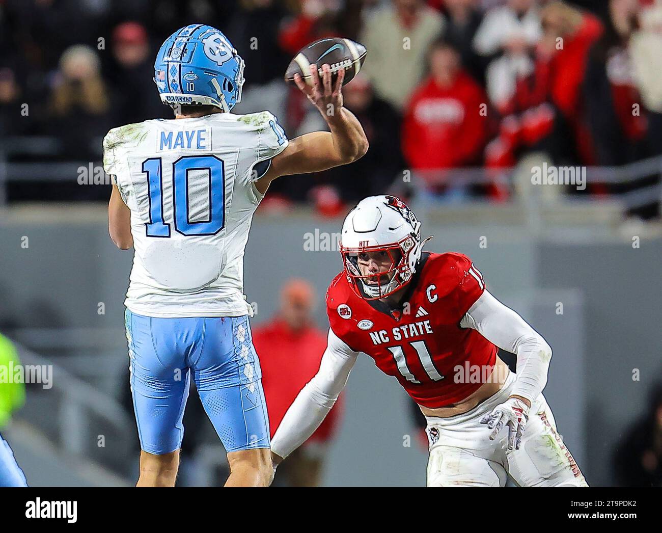 November 25, 2023: NC State senior Payton Wilson (11) pressures North ...