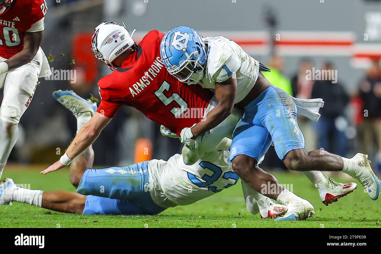 November 25, 2023: North Carolina senior Antavious Lane (1) takes down ...