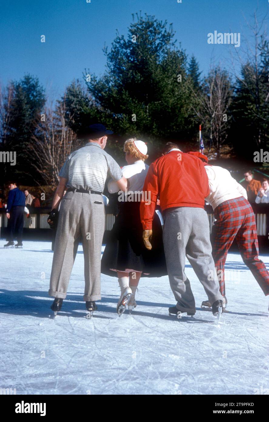 LIBERTY, NY - NOVEMBER 30: Two couples ice skate at Grossinger's Resort ...