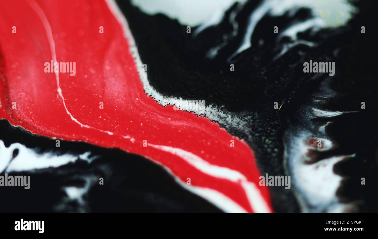 Paint drop water ink spatter red black white wave Stock Photo - Alamy