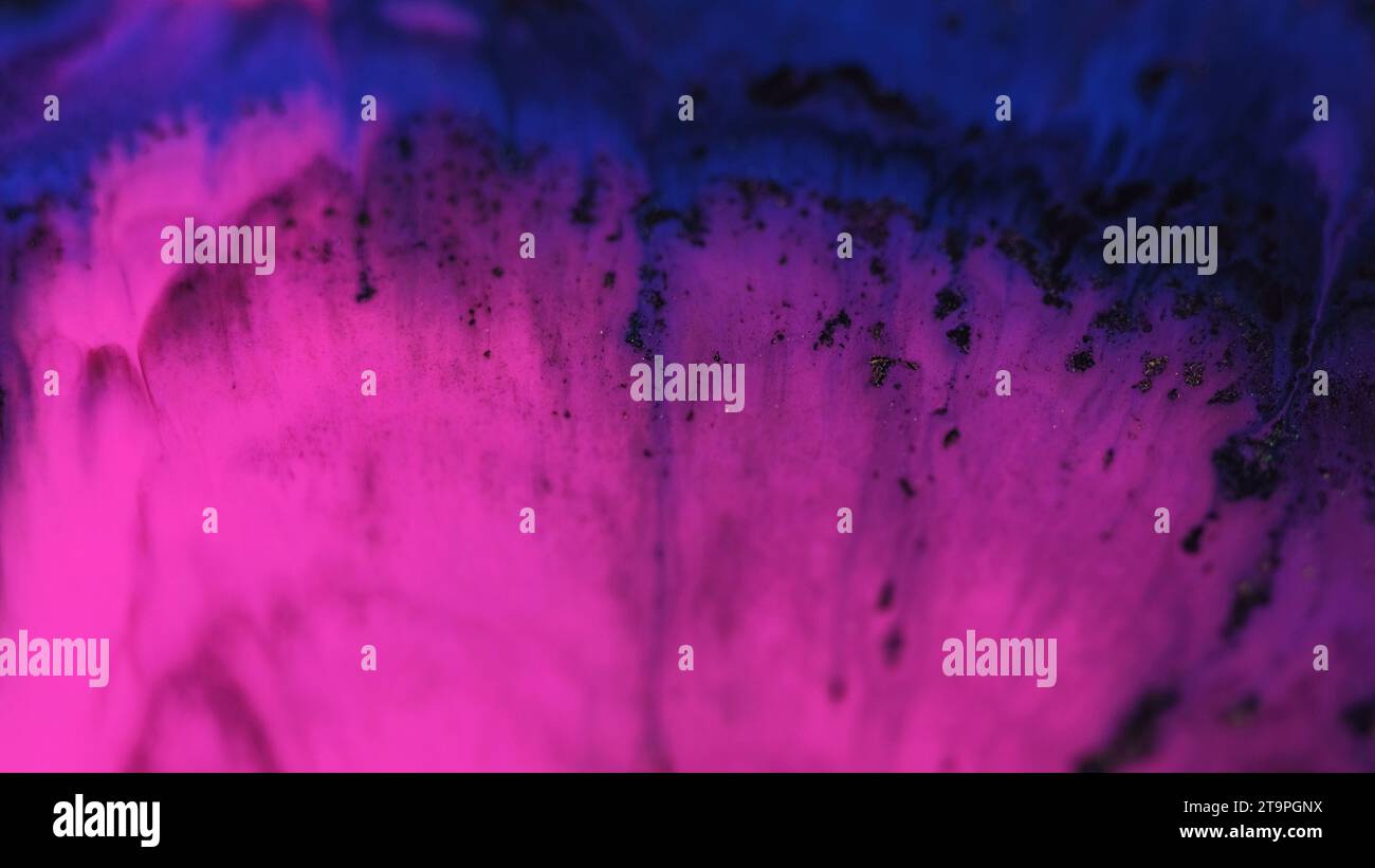 Paint splash ink water wave neon blue pink fluid Stock Photo - Alamy