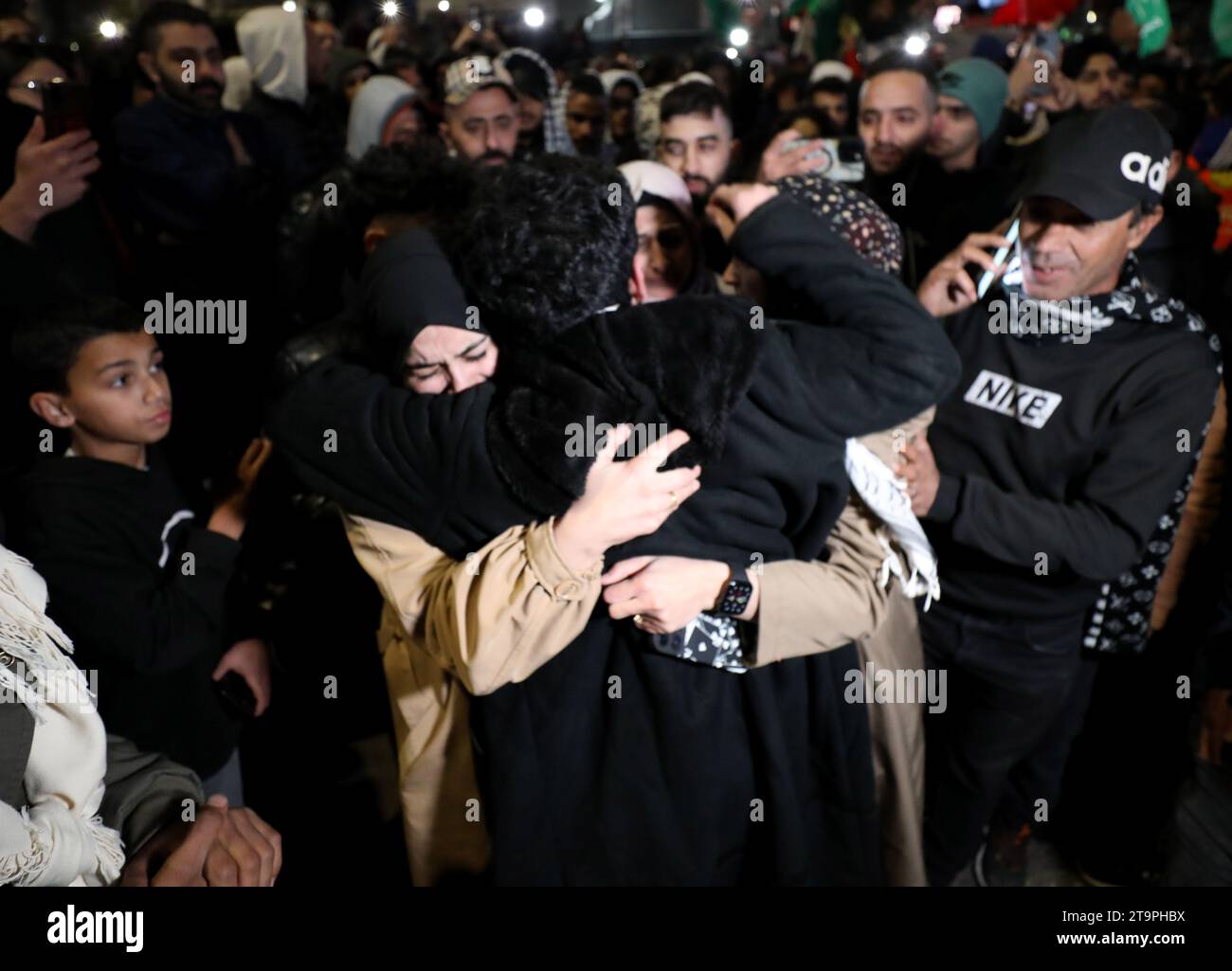 Ramallah. 26th Nov, 2023. A released Palestinian prisoner reunites with ...