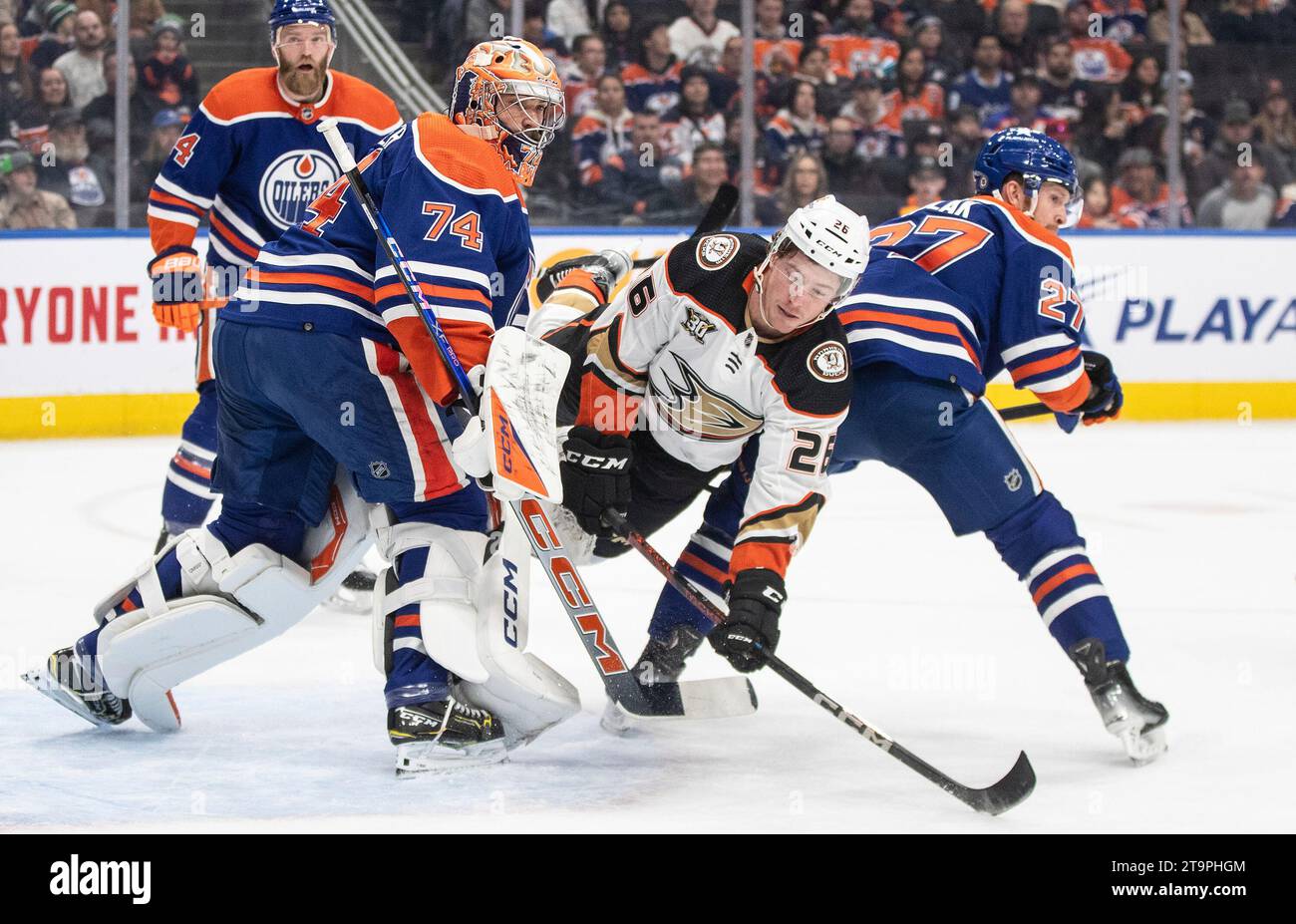 Anaheim Ducks' Brock McGinn (26) crashes into Edmonton Oilers goalie ...