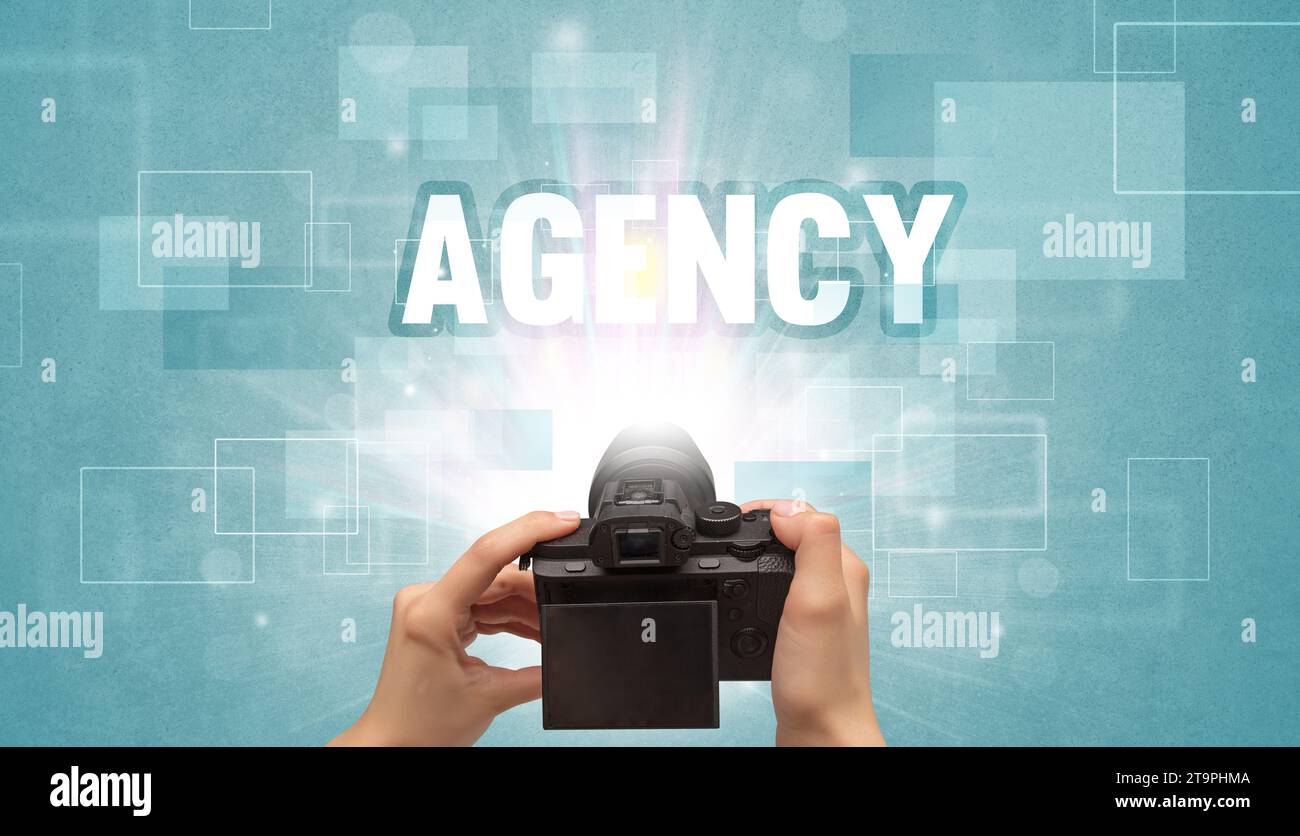 hand holding digital camera, traveling concept Stock Photo - Alamy