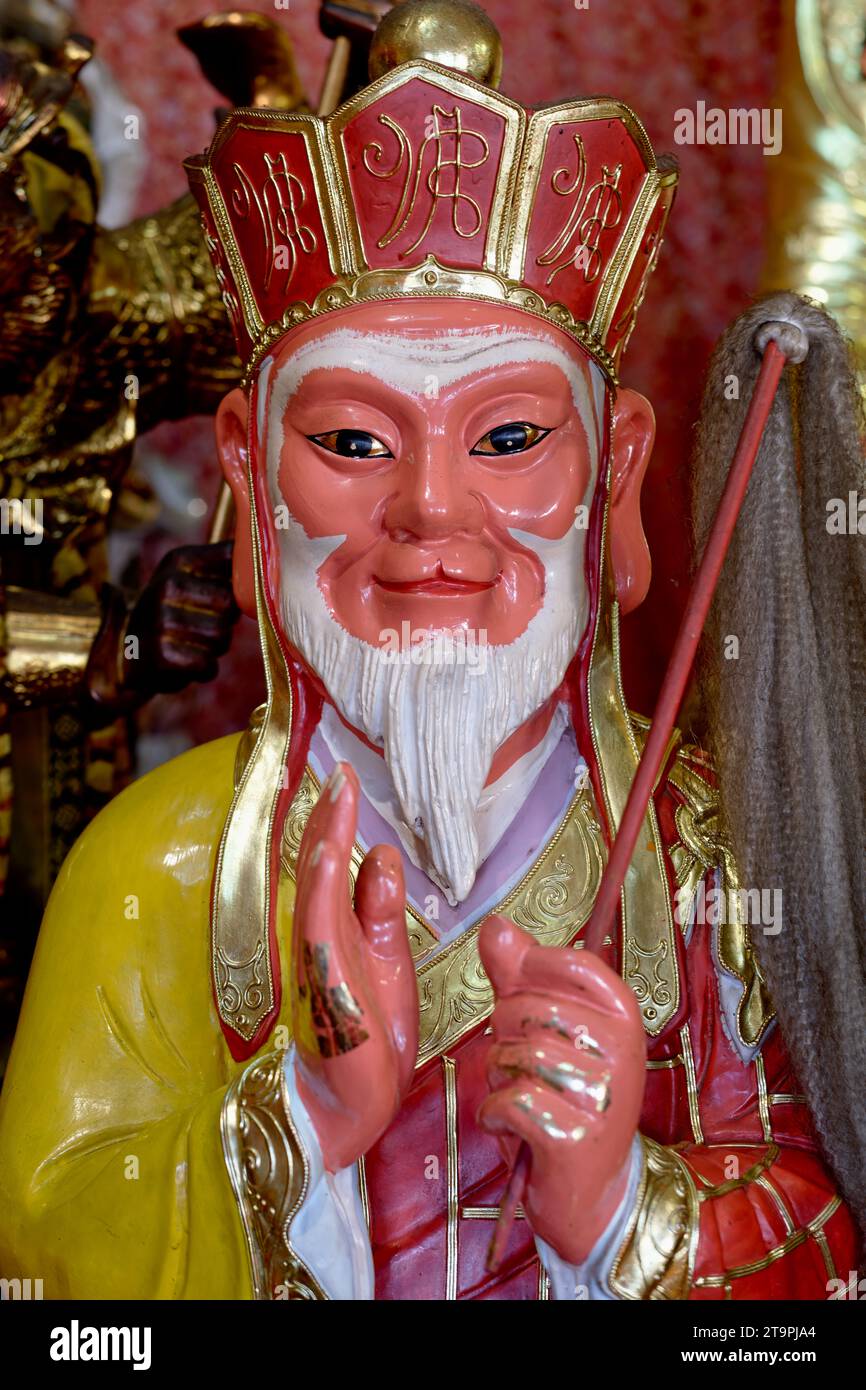 A figure of the Taoist emperor god on an altar at Jui Tui Temple ...