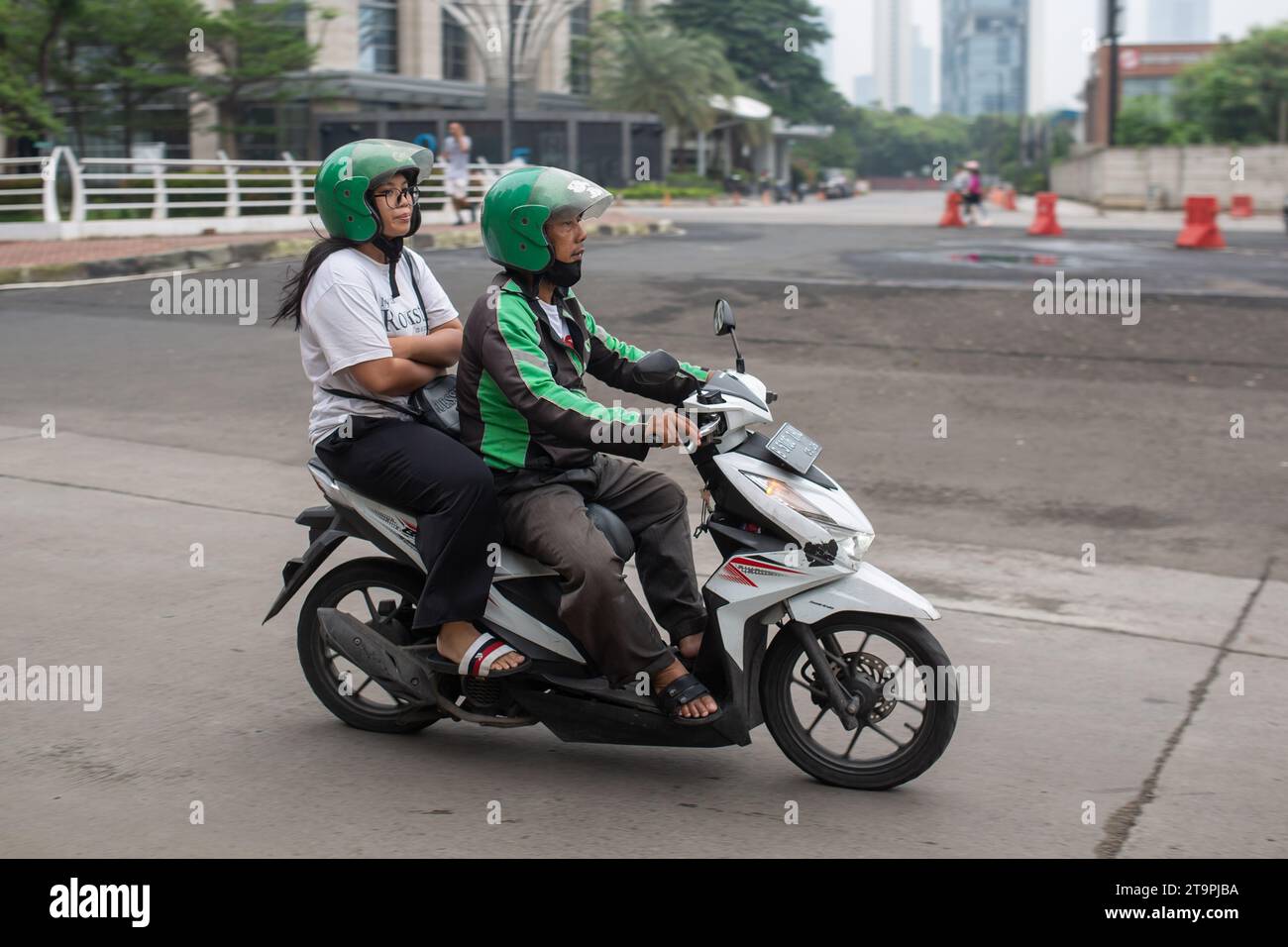 Jakarta, Indonesia - November 25, 2023: Gojek driver seen on the streets of Jakarta, Indonesia ...