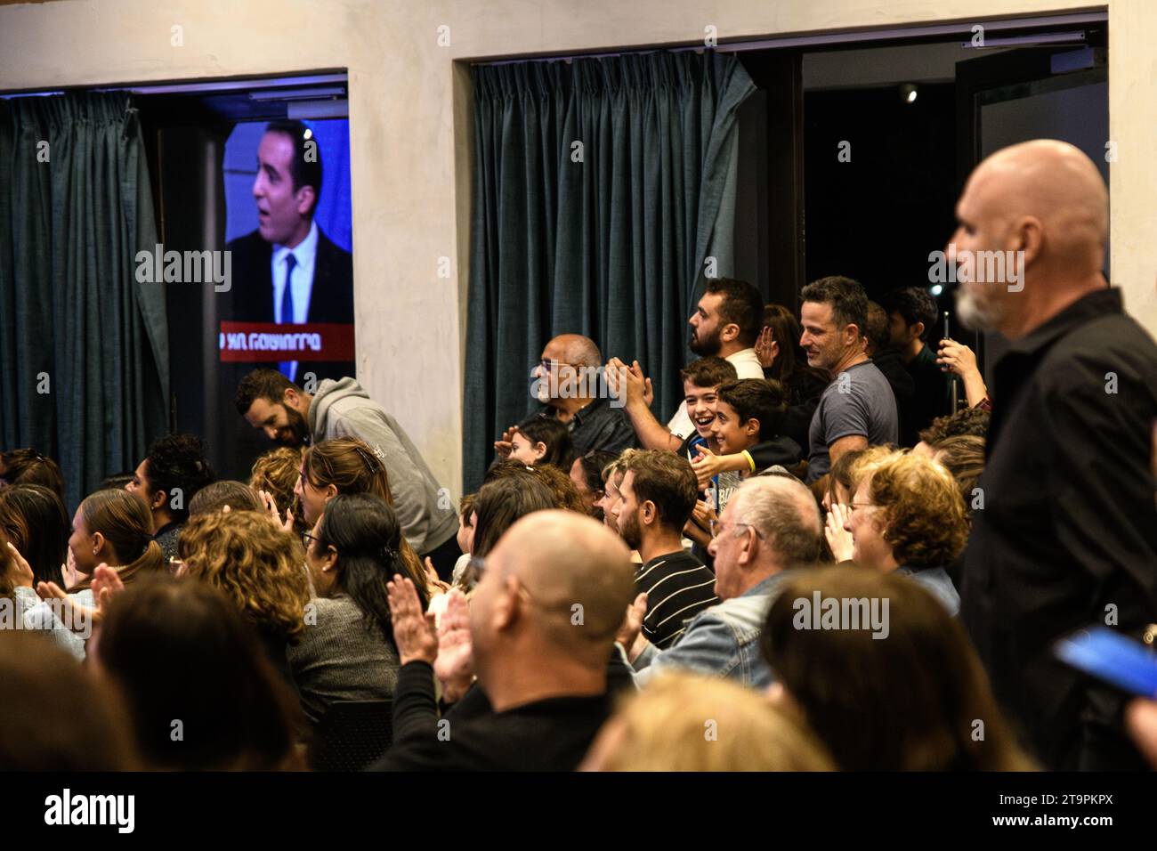 Shfaim, Israel. 26th Nov, 2023. Kids laugh as members of Kibbutz Kfar ...