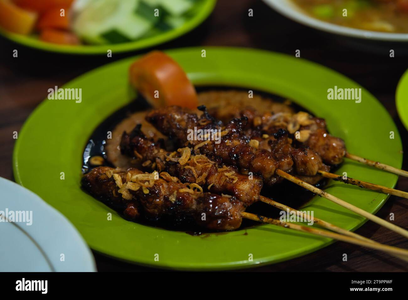 Traditional Indonesian Satay or Sate with peanut sauce, soy ketchup ...