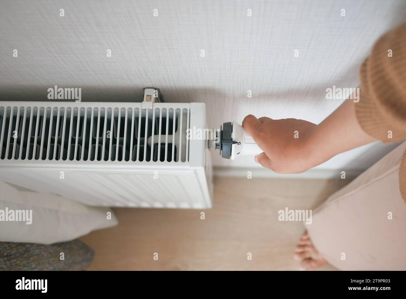 hand controls thermostatic knob of heating radiator Stock Photo - Alamy