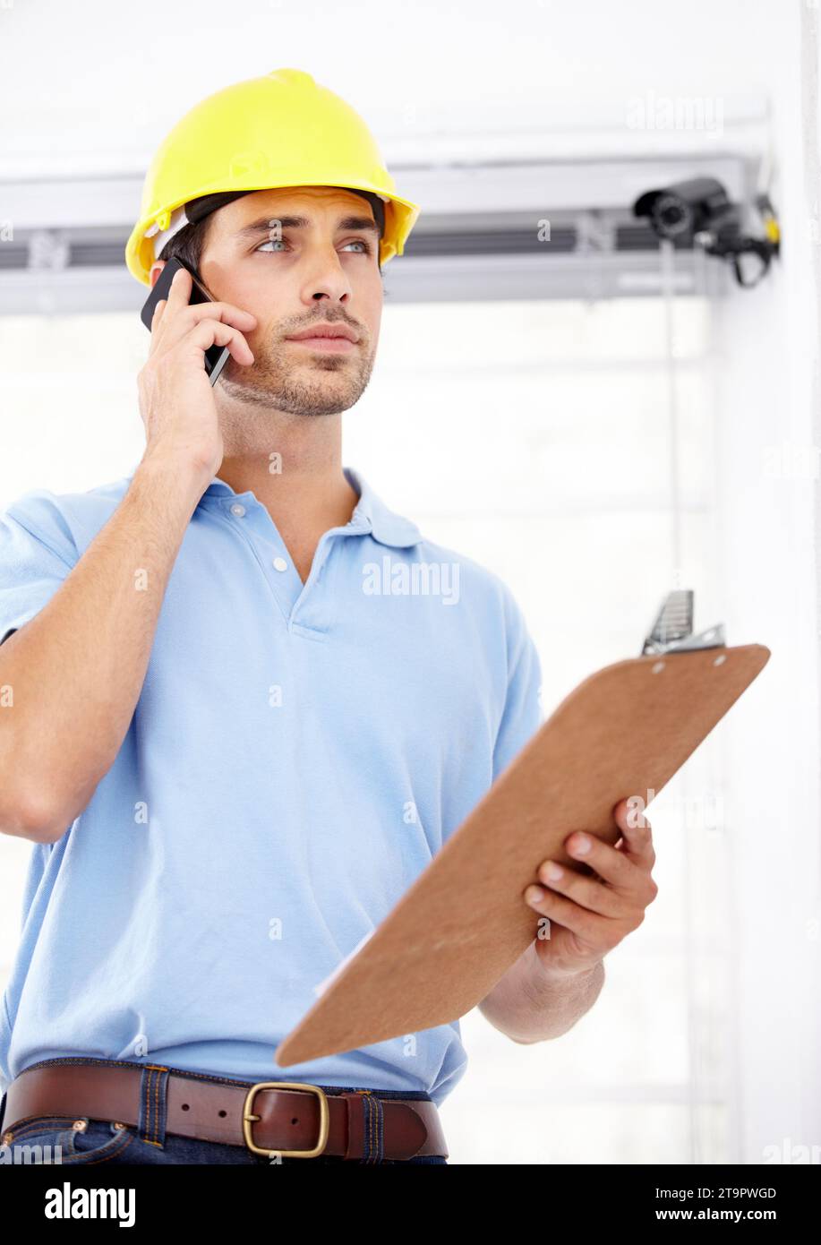 Technician, thinking and phone call for security camera, home ...