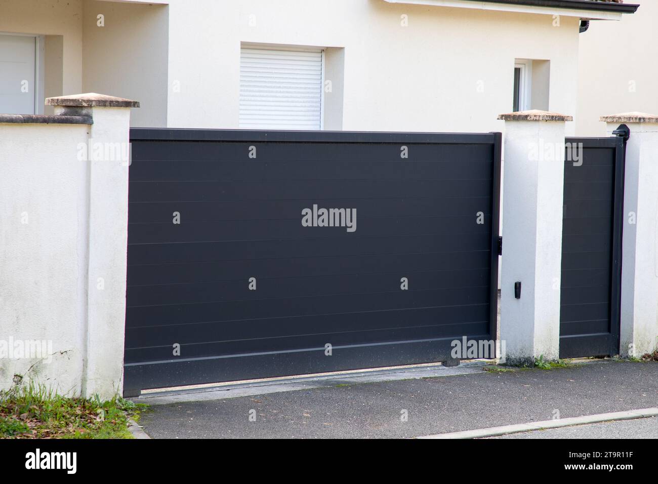 sliding portal gray high large metal gate and pedestrian grey door on ...