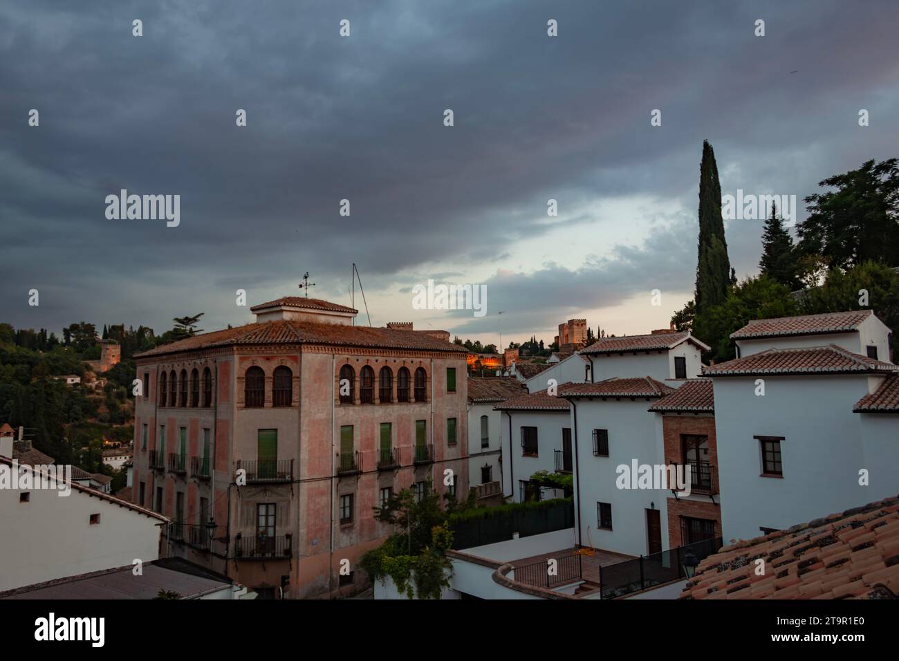 The beautiful stone buildings and tiled roofs in the old town ...