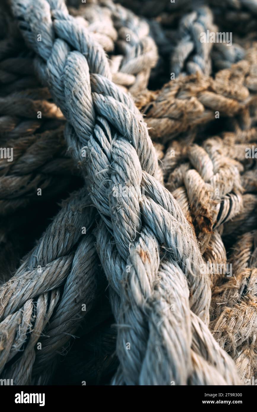 Old worn frayed ship ropes as background, selective focus Stock Photo ...
