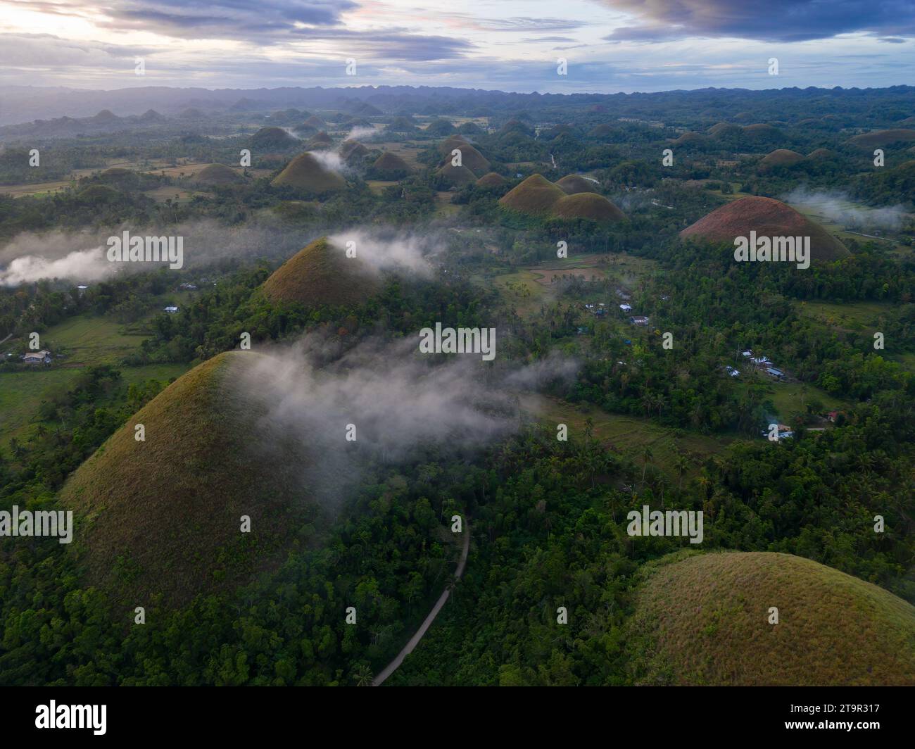 An aerial view of Chocolate Hills, Bohol Island, Philippines at sunset ...