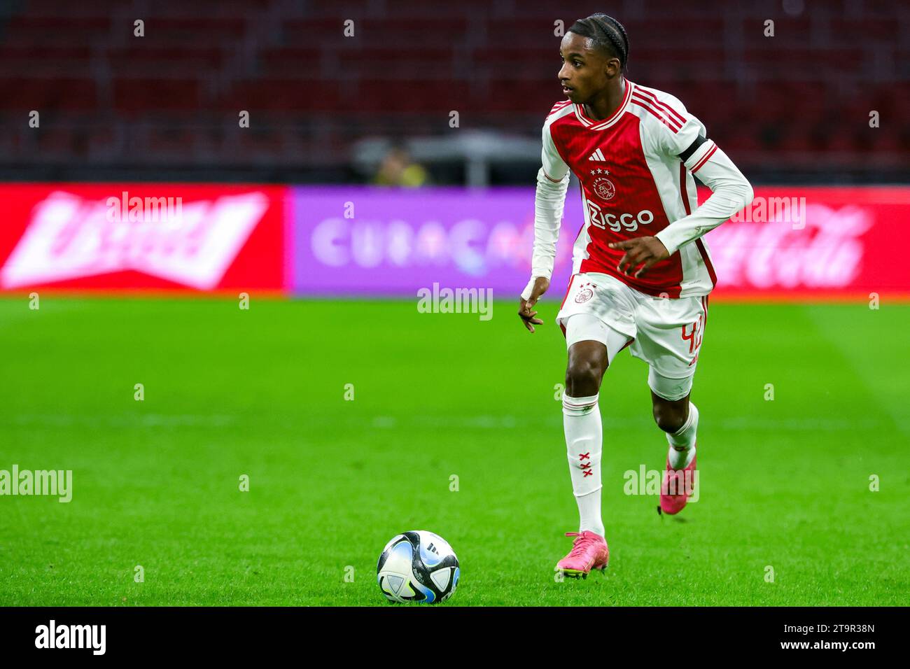 AMSTERDAM, NETHERLANDS - NOVEMBER 25: ArJany Martha (AFC AJAX) Controls ...