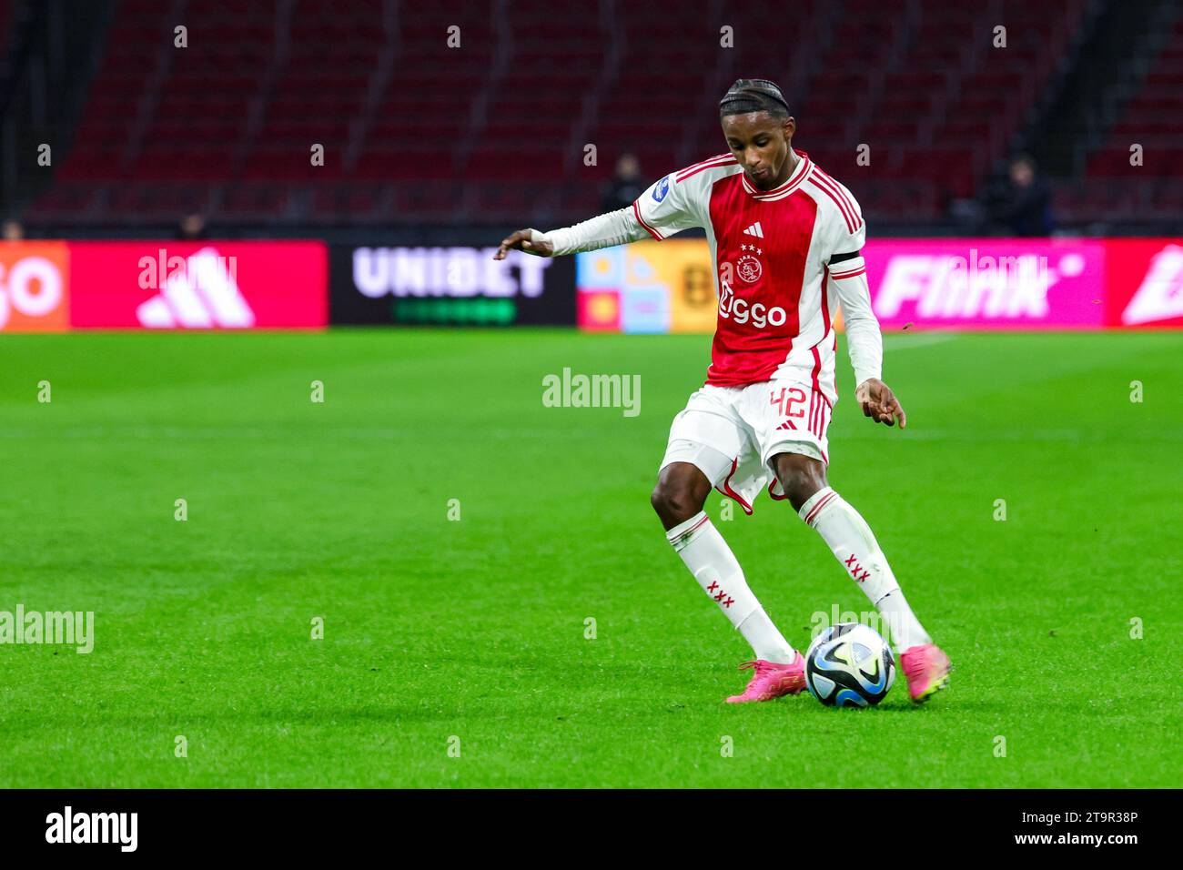 AMSTERDAM, NETHERLANDS - NOVEMBER 25: ArJany Martha (AFC AJAX) Controls ...