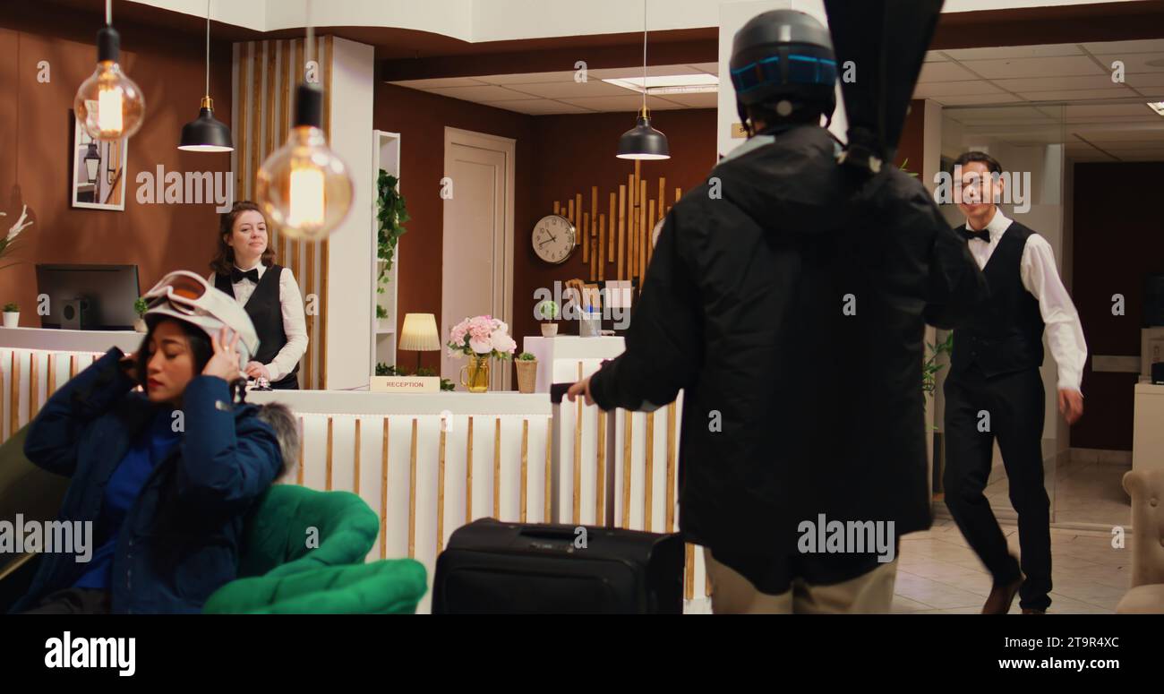 Person asking staff for slope direction upon his arrival at exclusive ...