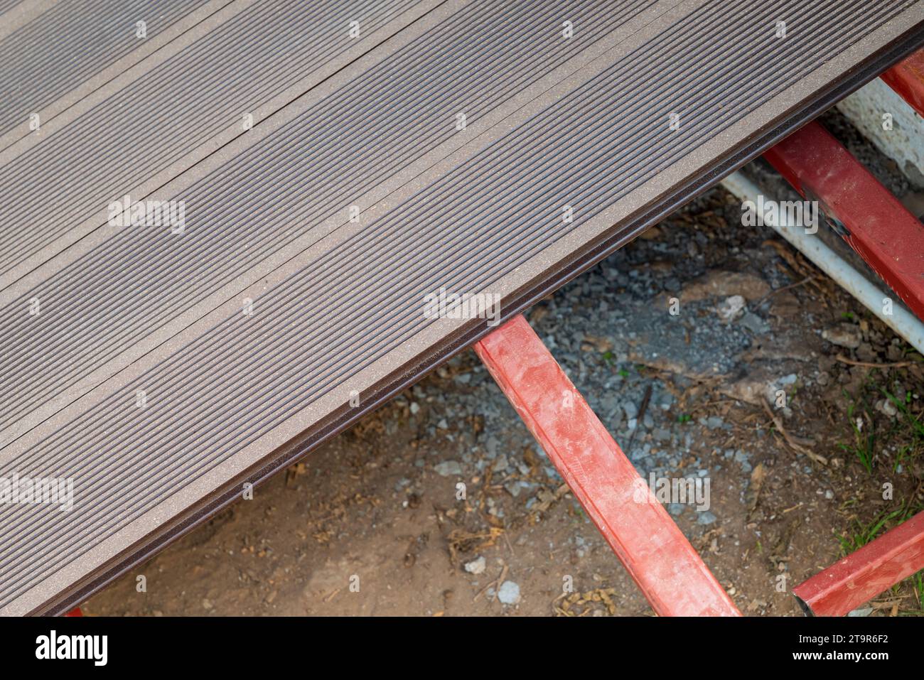 Brown WPC composite deck flooring mounted on steel profile Stock Photo ...