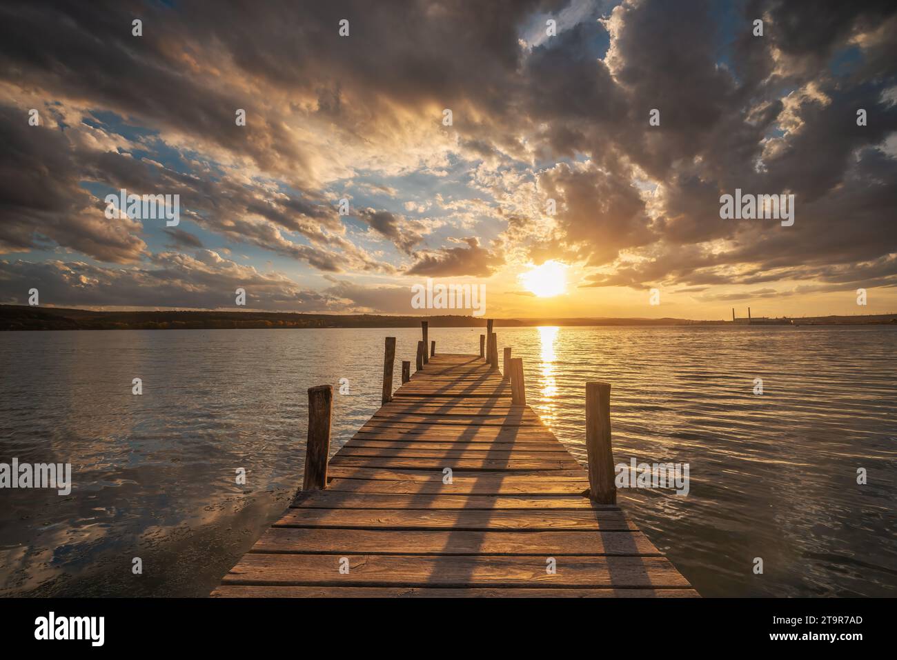 Small Dock at the lake, sunset shot Stock Photo - Alamy