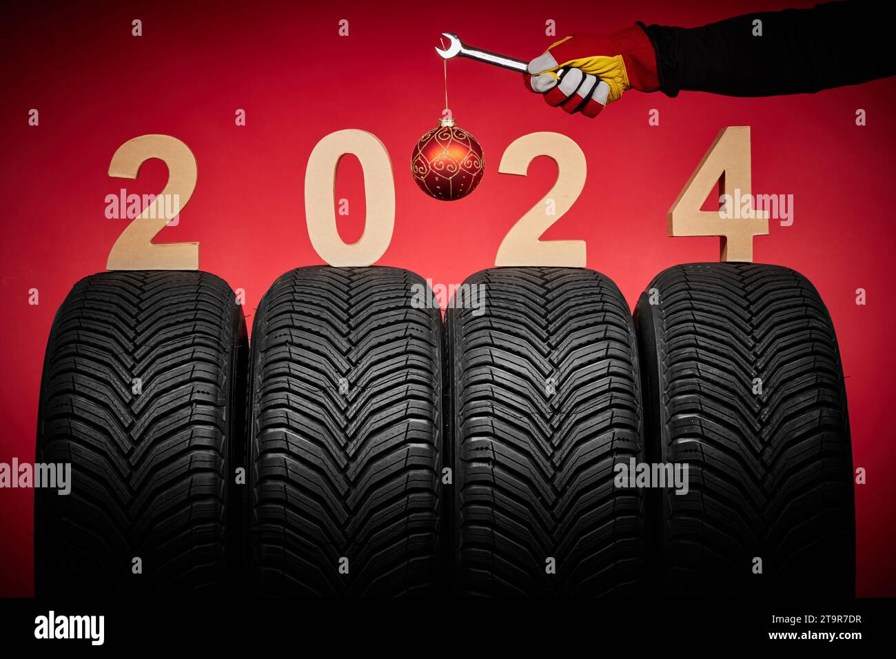 Winter car tires, big wheels service and hand of mechanic man with ...