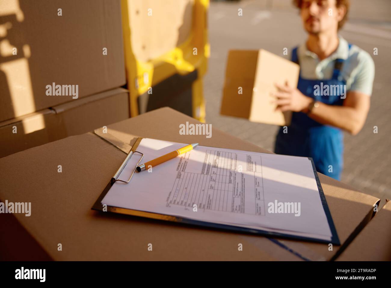 Closeup delivery document or application form for package receiving ...