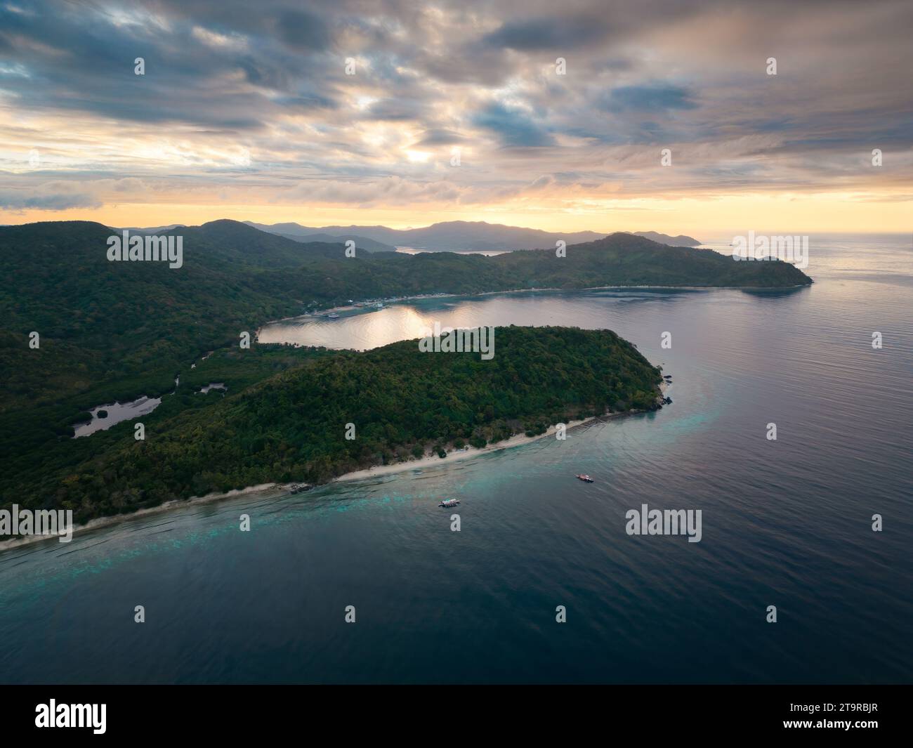 An aerial view of a sunrise over Culion Island, from El Nido to Coron ...