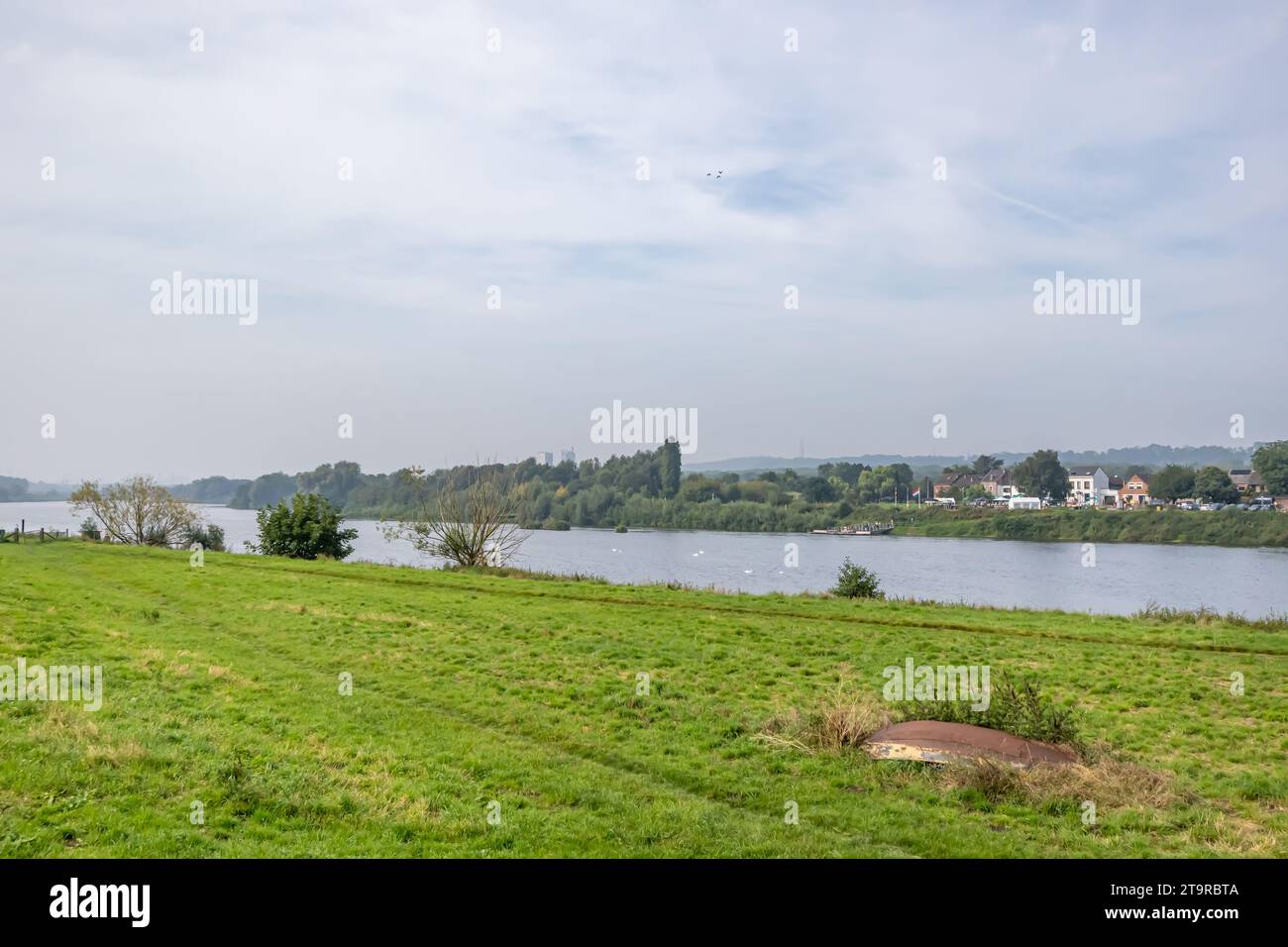 Dutch-Belgian border on Maas river, plain with green grass, Lanaye ...