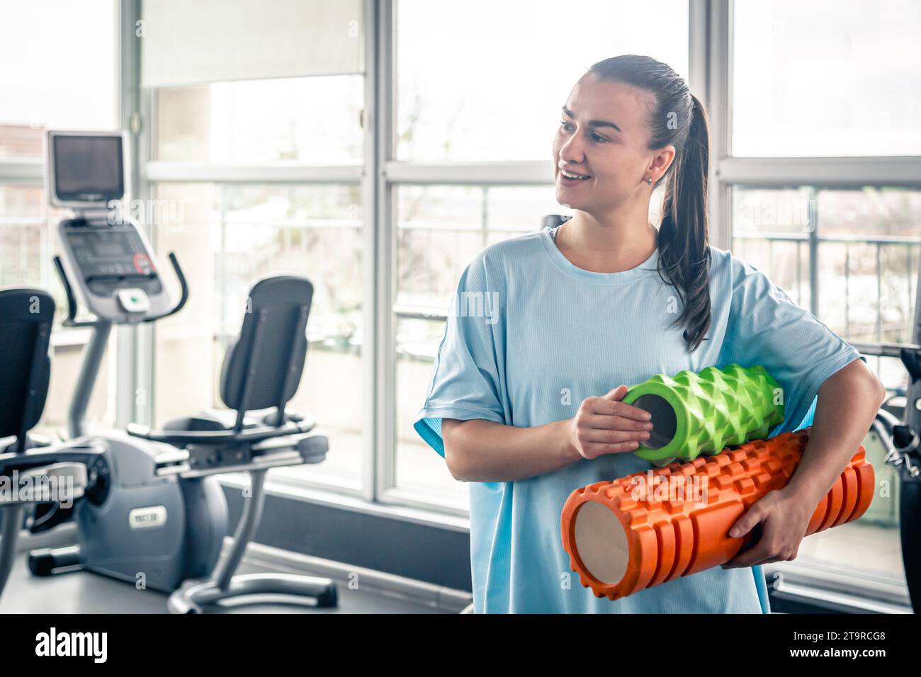 Woman exercises foam roller in hi-res stock photography and images - Alamy