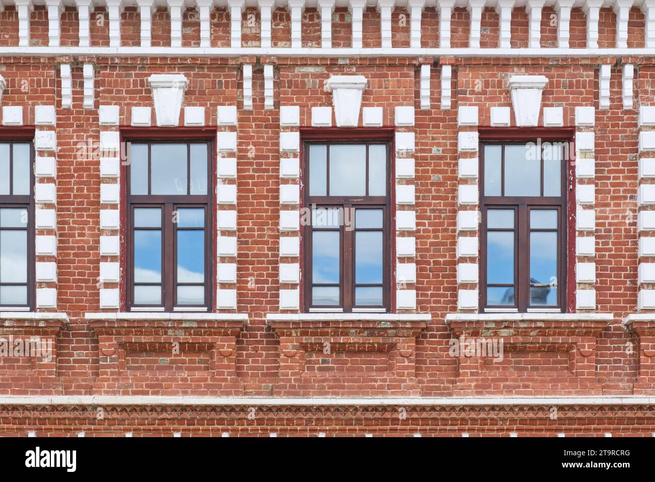 Windows, details of red brick building from 1880s in historical center ...