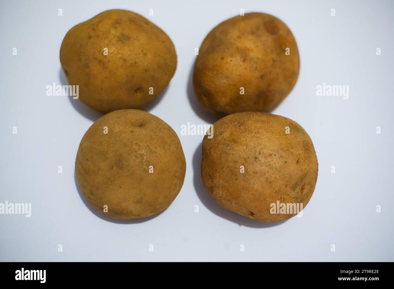 four raw potatoes, which can be a source of carbohydrates with lots of ...