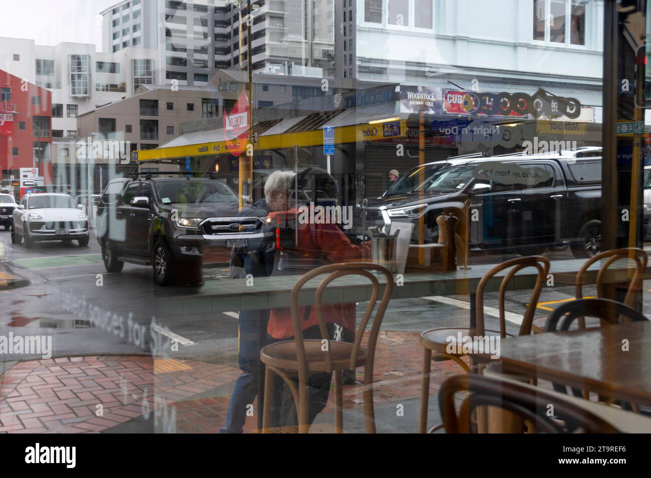 View through cafe windows with reflections of street, Wellington, North ...
