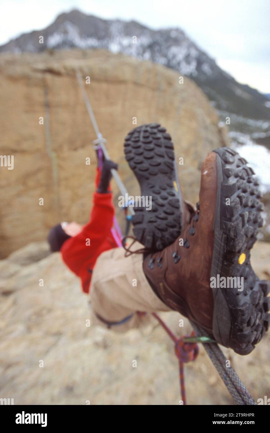 Climber crossing gorge by tyrolean traverse, Estes Park, Colorado Stock ...