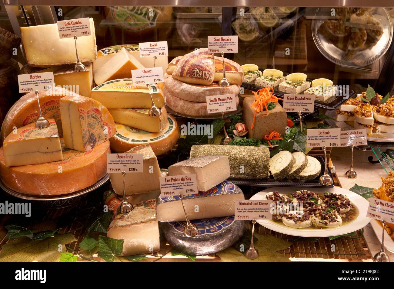 Display of cheeses at a grocery store Stock Photo - Alamy