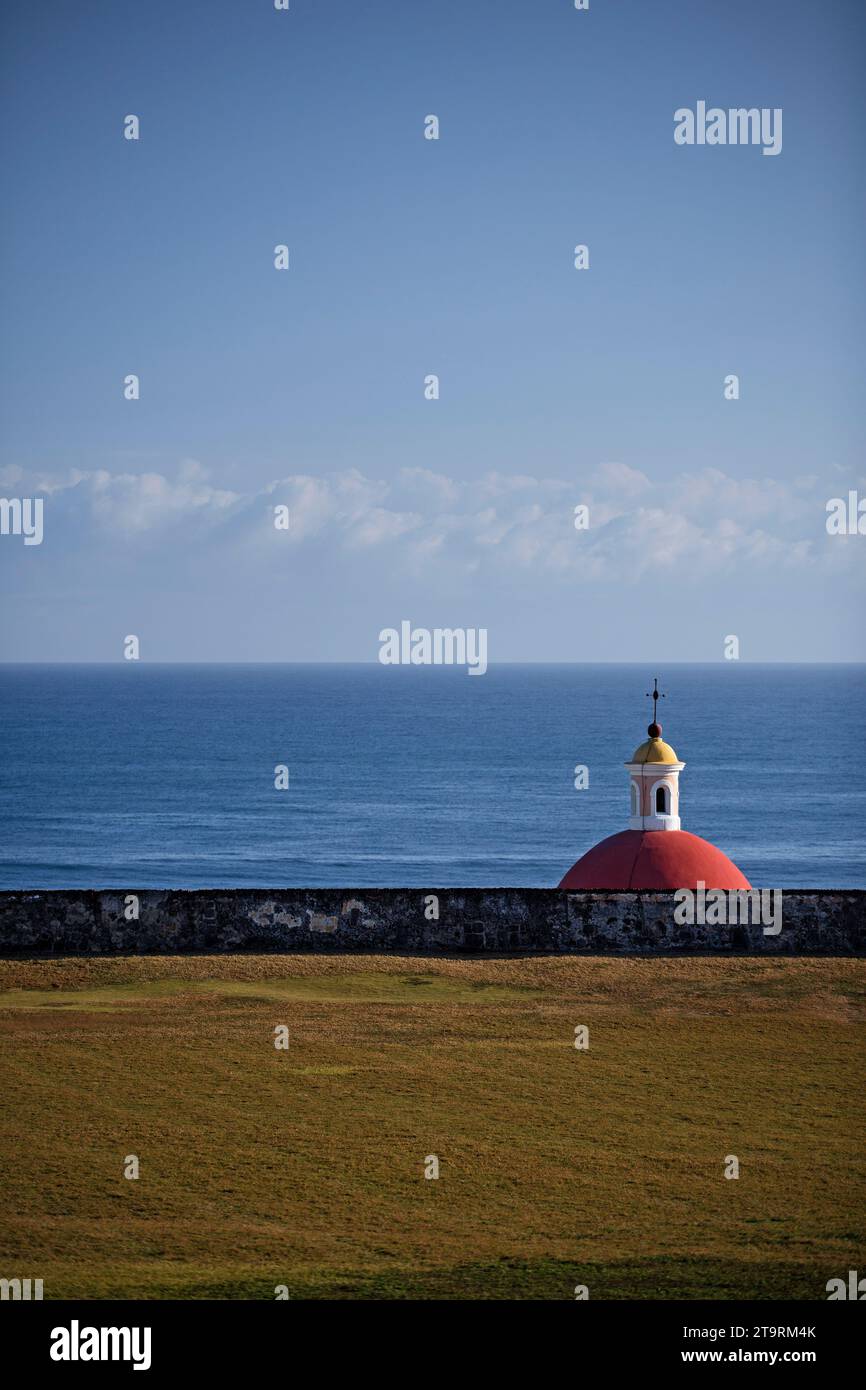 Red Chapel rising from the sea Stock Photo - Alamy