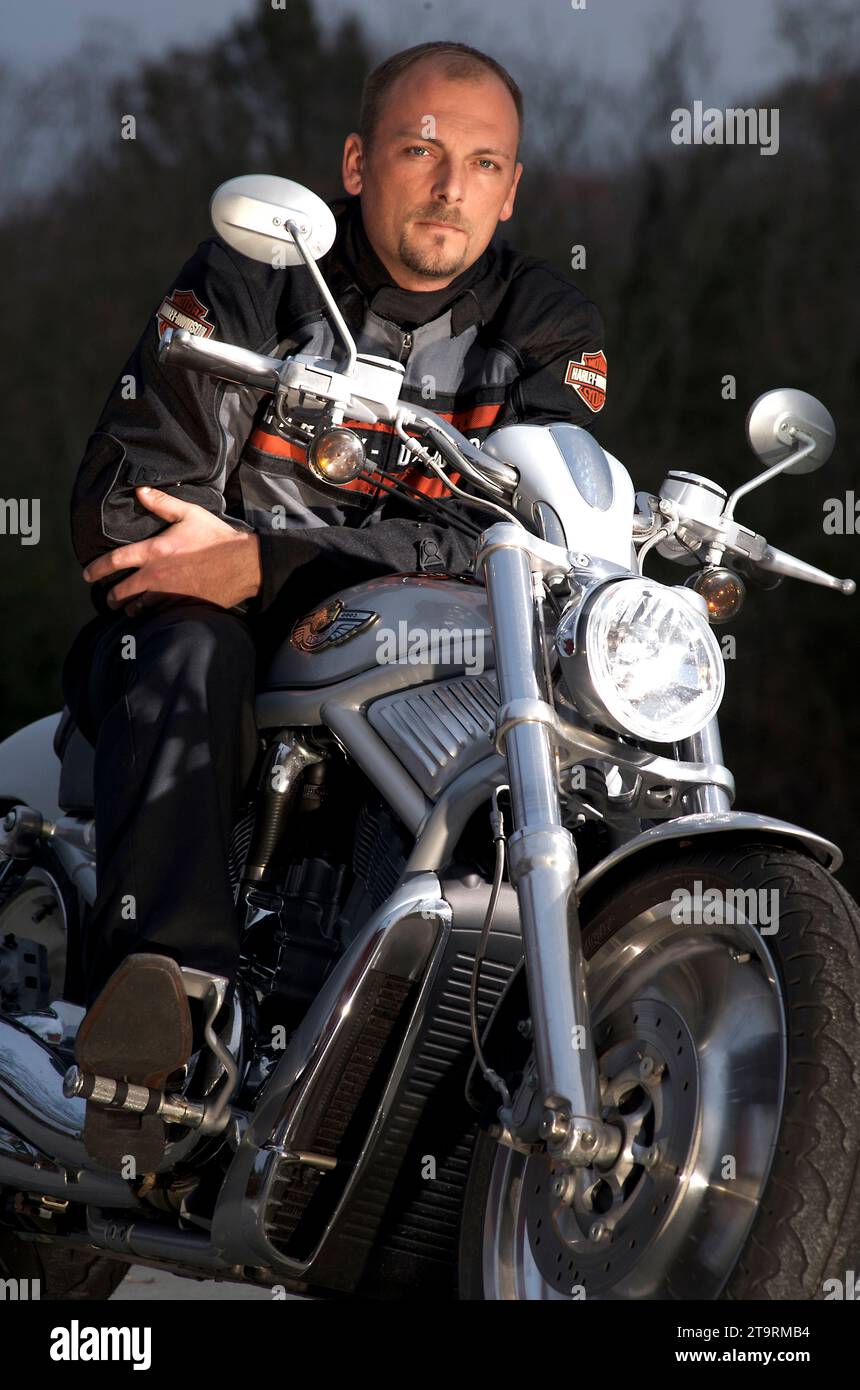Portrait of a wounded Iraq war veteran on his Harley Davidson ...