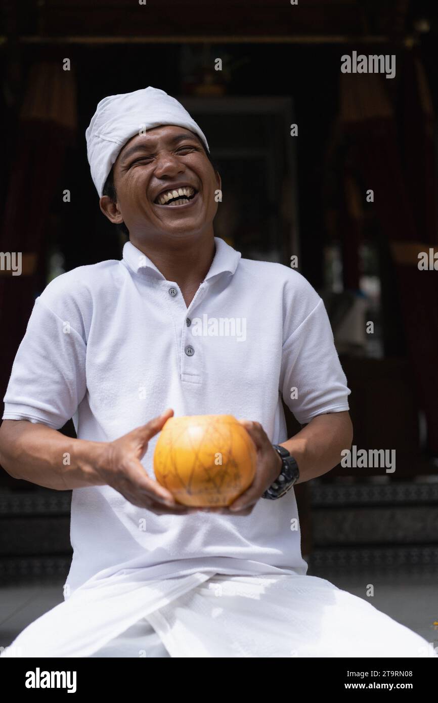 A Manku Jati man performs a ceremony in Bali, Indonesia Stock Photo - Alamy
