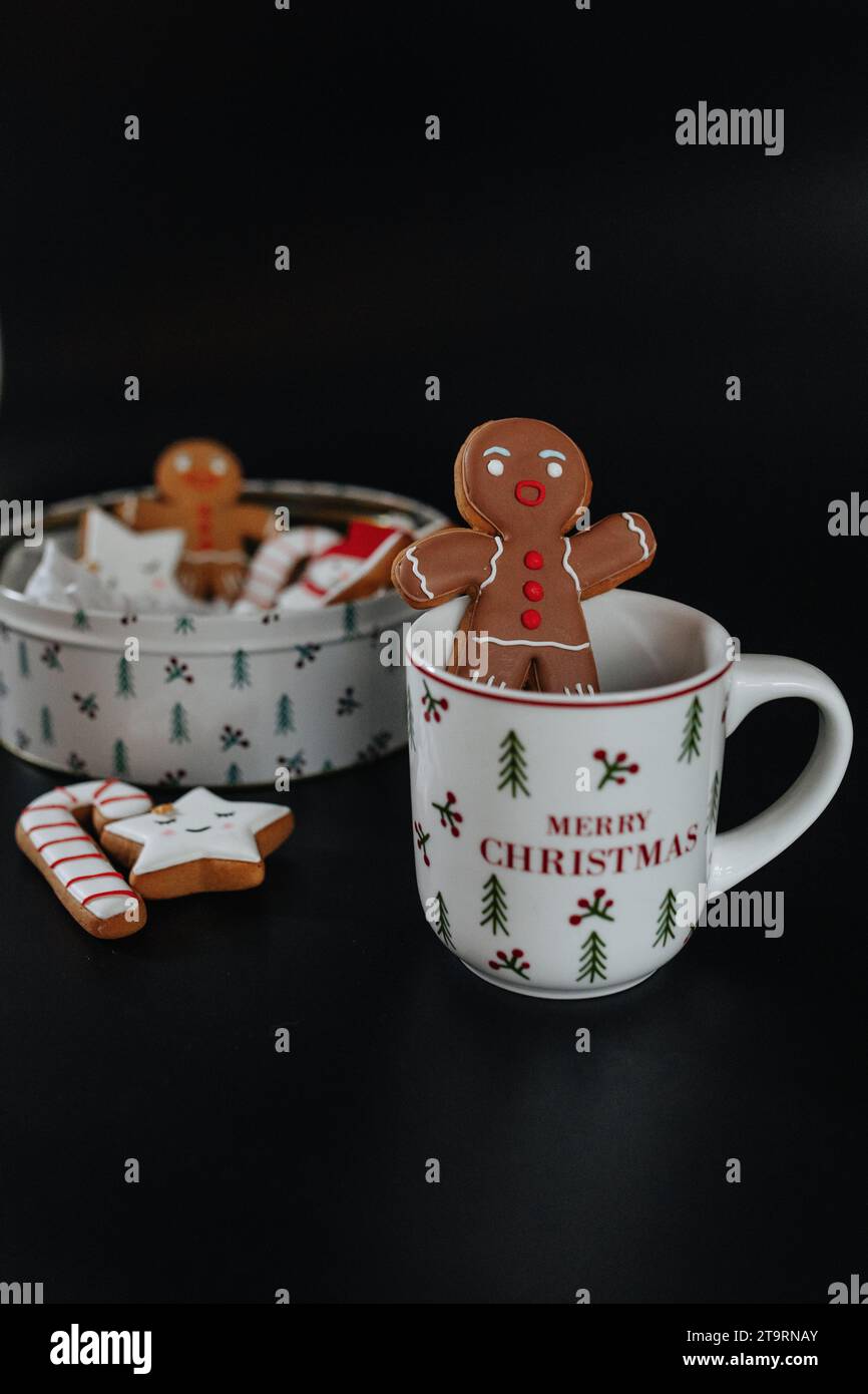 Gingerbread man sitting in the cup Stock Photo - Alamy