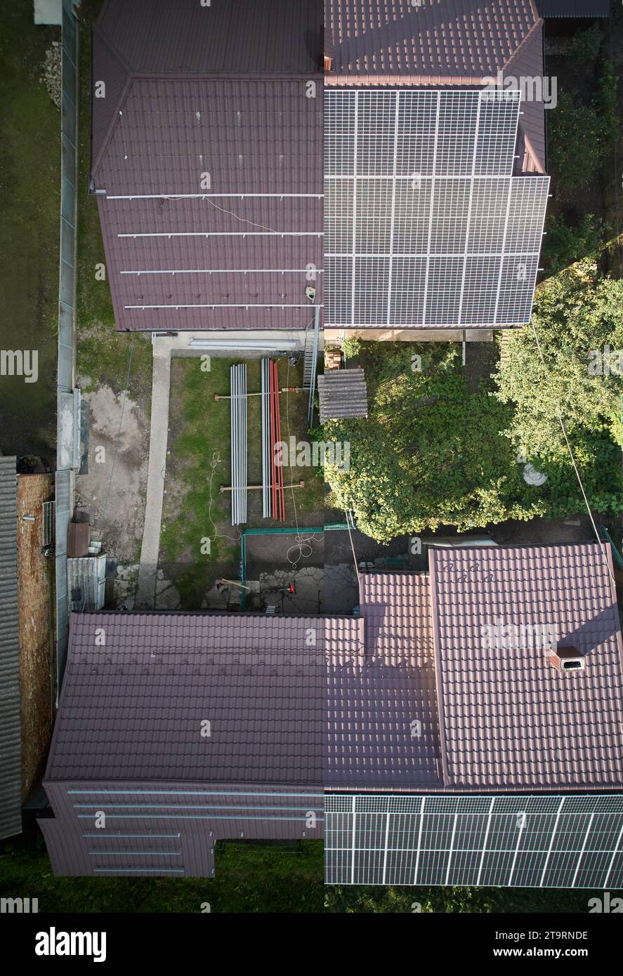 Collage of photos of installation and ready solar panels on the roof of ...