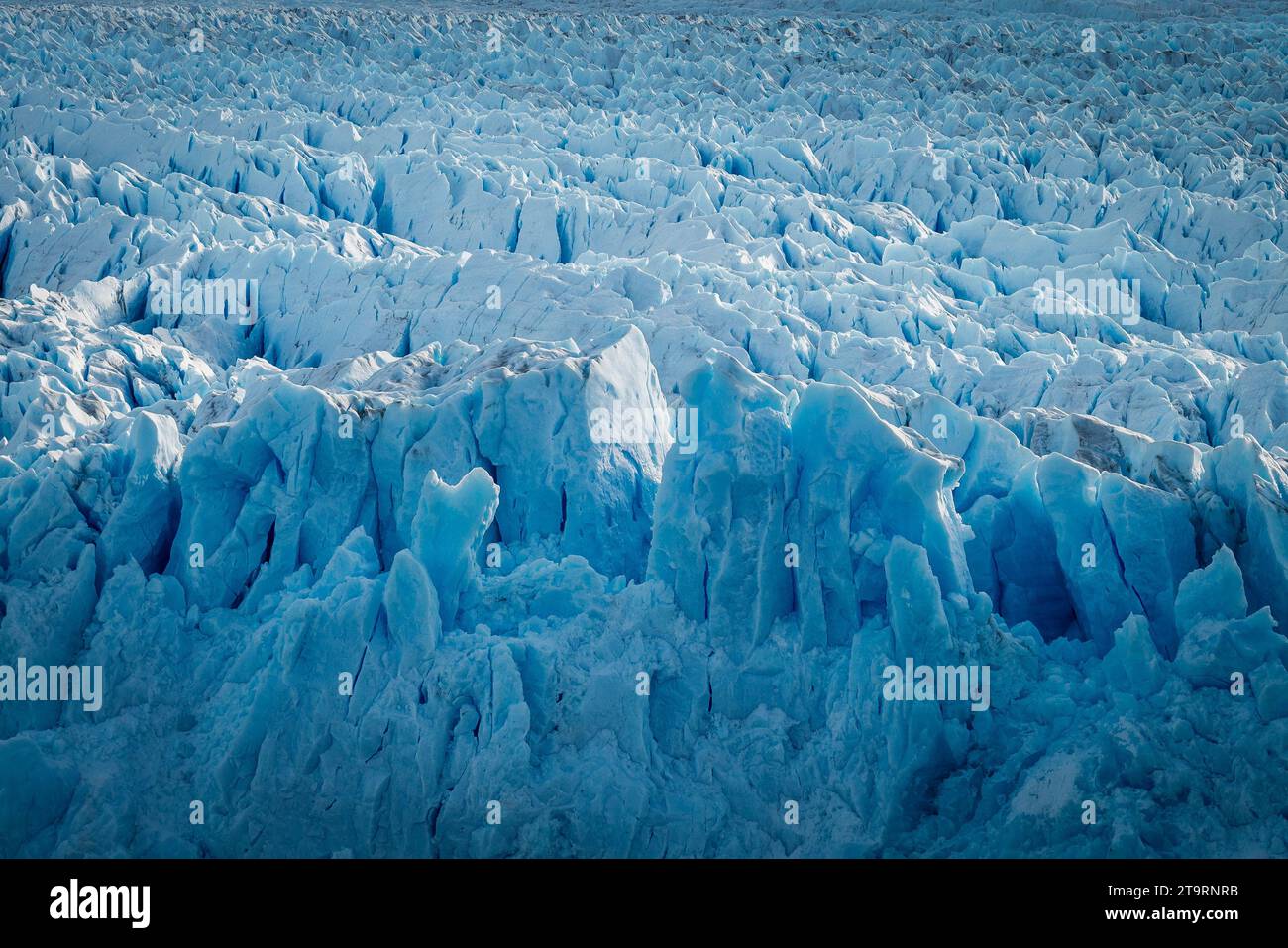 Textures of blue ice on a glacier Stock Photo - Alamy