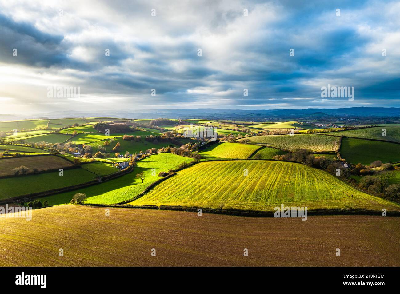 Lights and Shadows over Fields and Farms from a drone, Devon, England ...