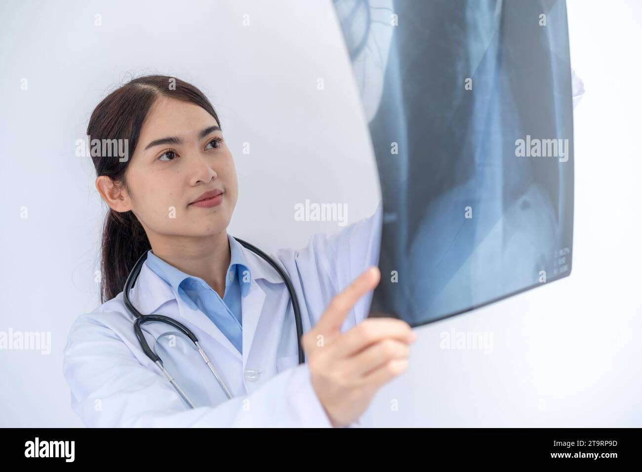 Female medical doctor explaining scan hi-res stock photography and ...